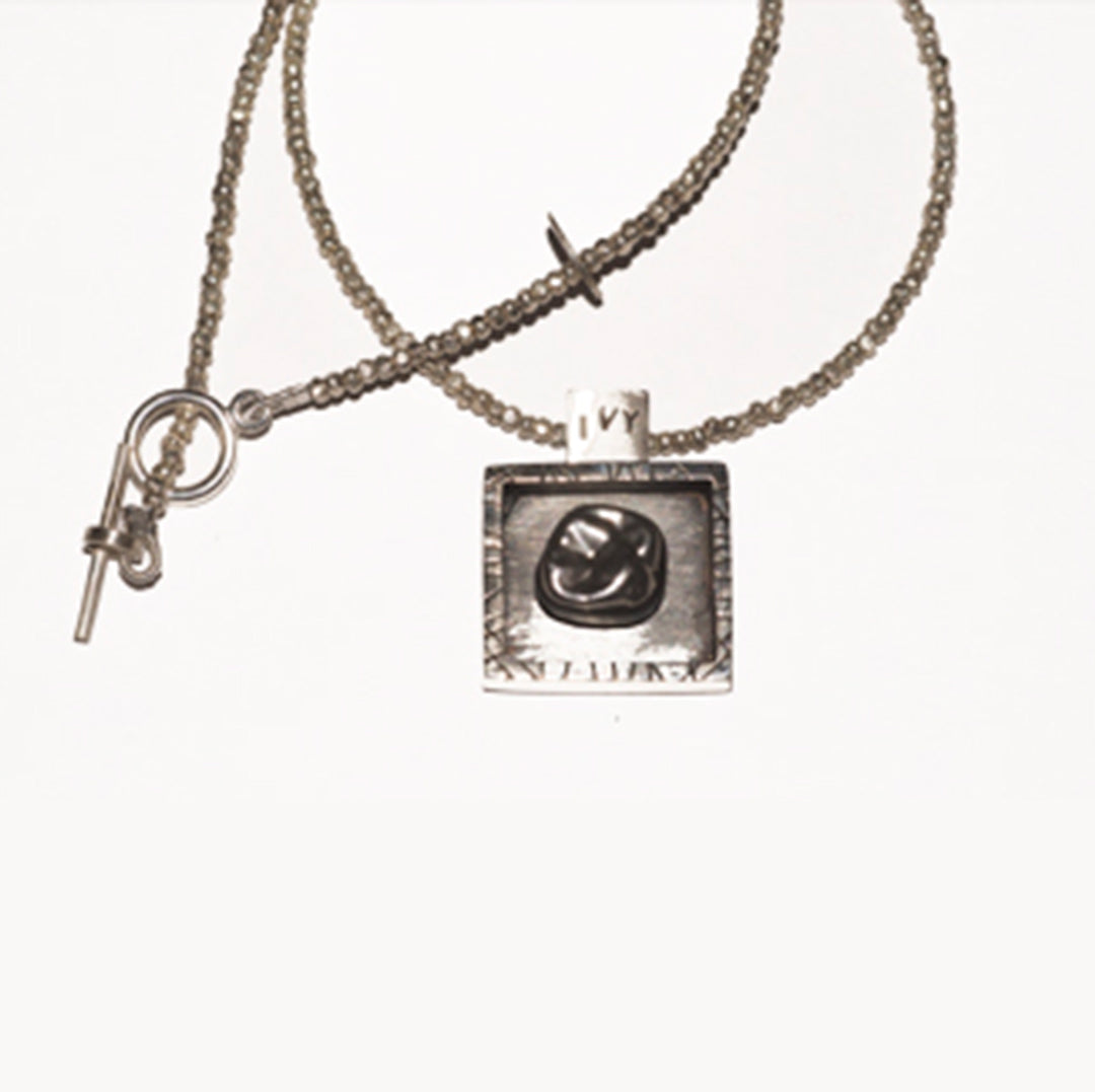 Little tooth neckpiece – Small Space Jewellery